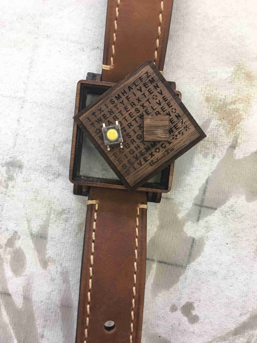 This Tiny Wooden Word Clock Can Be Worn as a Watch - Make: